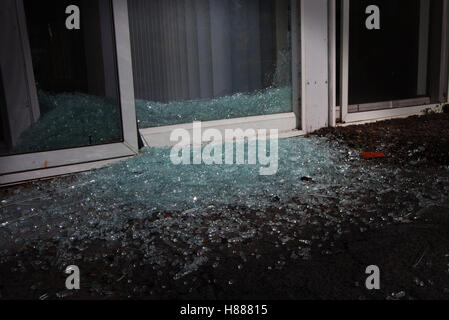 Sliding glass door that has been shattered by a criminal Stock Photo ...