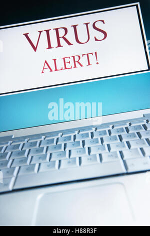 Virus Alert Sign on computer Stock Photo - Alamy
