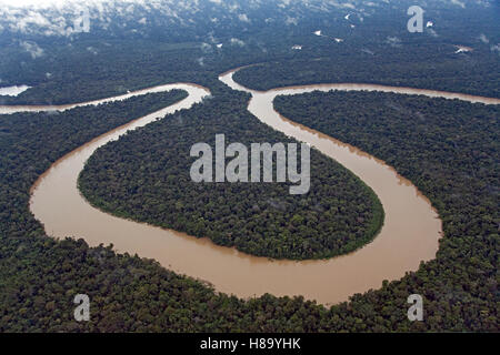 Silt-laden Yavari River winding through the rainforest, Amazon Basin ...