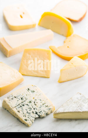 Soft cheese, Different kinds of delicious cheese on table Stock Photo ...
