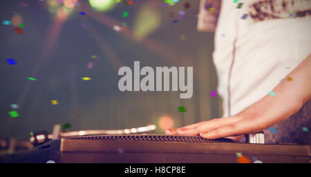 Cropped image of DJ mixing music at record player in nightclub Stock ...