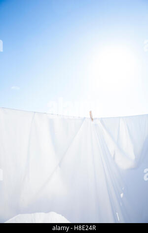 Clean white sheets drying in the sun Stock Photo - Alamy
