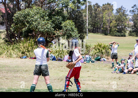Australian girls school children play each other at softball soft ball ...