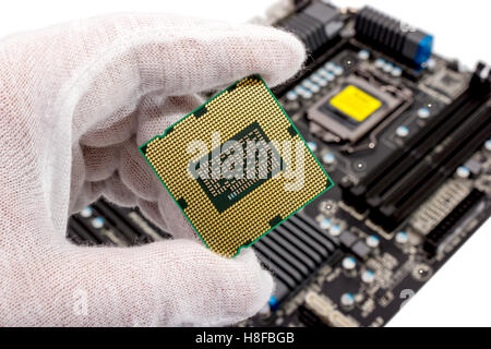 Electronic collection - The repairman holding computer processor in ...