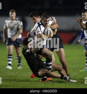 New Zealand's Joseph Tapine is tackled during the Rugby League World ...