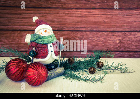 snowman and coniferous tree limb image Stock Photo - Alamy