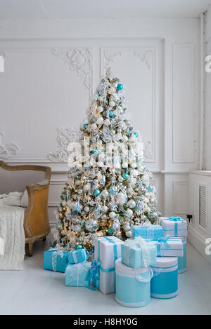 Shiny christmas gift boxes. Christmas decoration ornaments on white ...