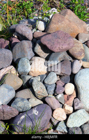 Background pattern of river rocks with rounded corners and some smooth ...