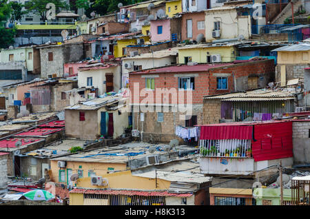 Colorful houses of the poor inhabitants of Luanda, Angola. In the ...