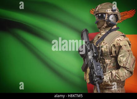 Military police with the Zambian Defense Force listen to a brief from ...