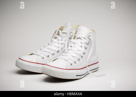 white converse photographed on a white background Stock Photo - Alamy