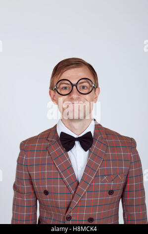 Young nerd posing isolated in a white background Stock Photo - Alamy