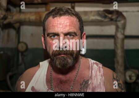 A woman and a man are working in the boiler room Stock Photo - Alamy