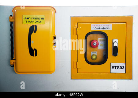 Emergency train stop button sign on the platform of a Japanese railway ...