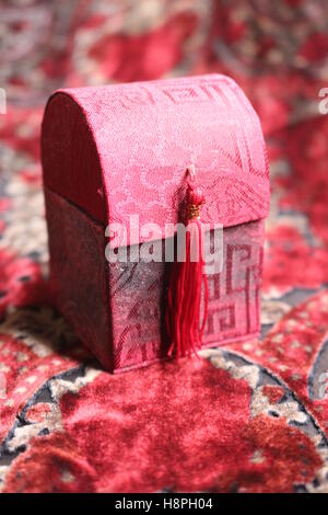 Decorative red trinket box with lid off isolated on white background ...