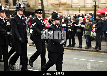 Members of the British Police Force taking part in the Remembrance Day ...