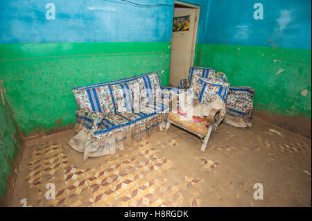 Interior of a poor African slum house showing devastation following a ...