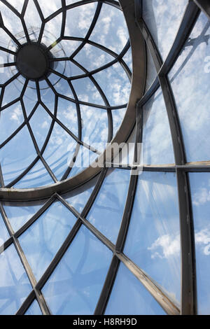 Lighthouse metallic and glass dome structure detail under blue sky ...