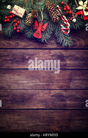 Christmas wooden background with fir tree and red bauble Stock Photo ...