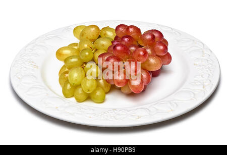 Grapes on plate isolated, with path in front of white background Stock ...