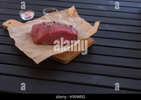 Peace of beef fillet for steak on table Stock Photo - Alamy