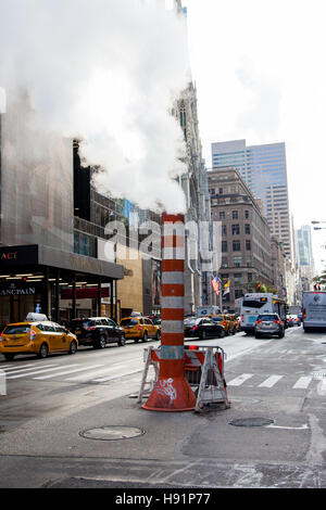 Steam escaping into the New York city street, Manhattan, New York ...