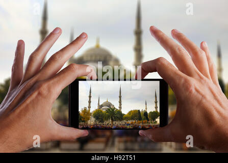 hand on smartphone Concept travel on vacation Stock Photo - Alamy