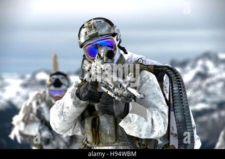 U.S. Navy SEAL soldiers demonstrate winter warfare techniques in snow ...