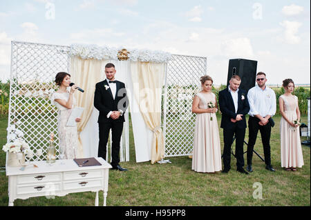 Amazing wedding ceremony. Groom waiting his bride Stock Photo - Alamy