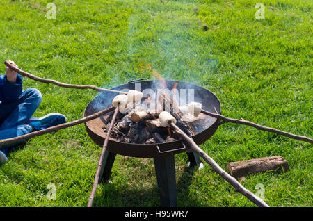 Bread toasting on an open fire Stock Photo - Alamy