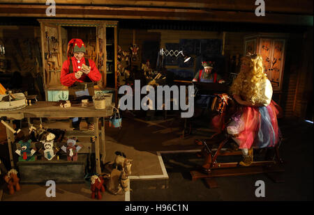 Elves work in the toy factory at SantaPark, in Rovaniemi, Finland ...