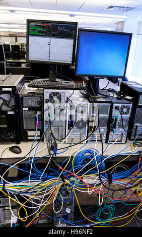 Computers connected with many cables Stock Photo: 126153077 - Alamy