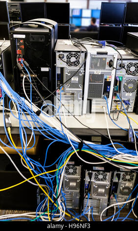 Computers connected with many cables Stock Photo: 126153077 - Alamy