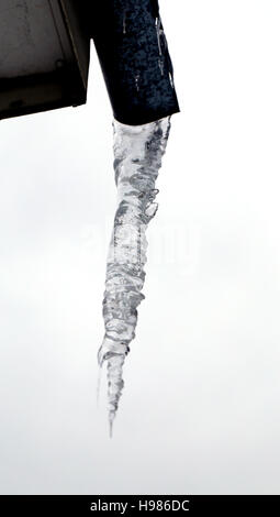icicles on the roof melt in the spring sun Stock Photo - Alamy