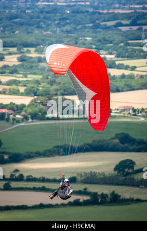 Parascender flying over the South Downs at Devil's Dyke Stock Photo - Alamy