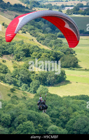 Parascender flying over the South Downs at Devil's Dyke Stock Photo - Alamy