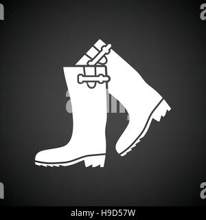 Hunter's rubber boots icon. Black background with white. Vector ...
