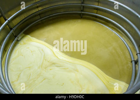 Inside aluminum fermentation vat with corn mash and water in craft ...