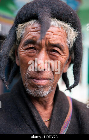 A Monpa man in traditional dress in the remote Tawang Valley, Arunachal ...