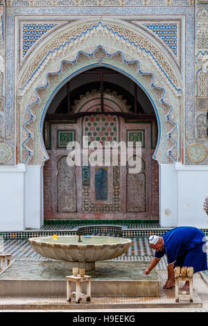 Muslim men perform wudu, or washing before praying in a mosque Pakistan ...