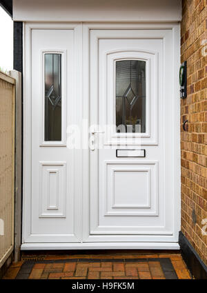 Modern upvc white front door with glazed fanlight of house UK Stock ...