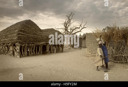 Ansongo, Mali, Africa - January 28, 1992: Dogon village and typical mud ...