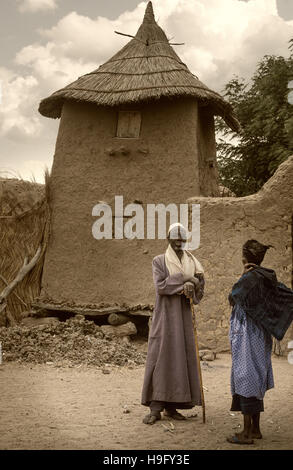 Ansongo, Mali, Africa - January 28, 1992: Dogon village and typical mud ...