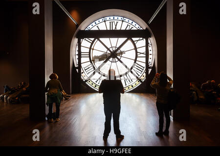 view through the giant clock of the Musee d'Orsay in Paris, France ...