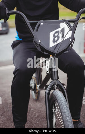 Cyclist sitting on a BMX bike in the Park Stock Photo - Alamy