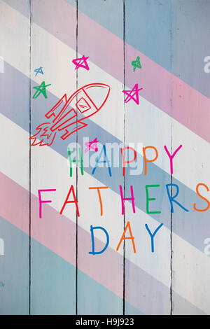 Composite of father's day text and happy african american father ...