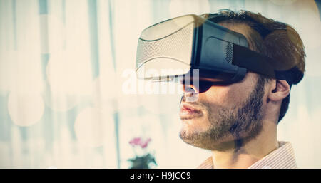 Businessman using an oculus Stock Photo - Alamy
