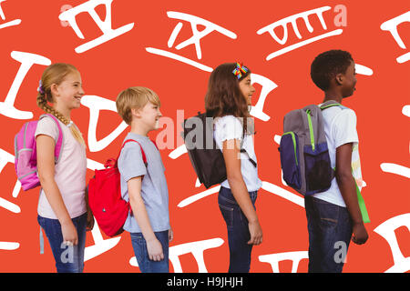 School kids standing in the line with books Stock Photo - Alamy