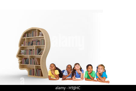 Composite image of cute kids thinking Stock Photo - Alamy