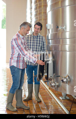 The stainless steel vat room of a wine cellar. Stellenbosch, South ...